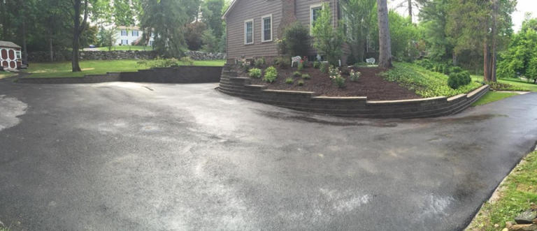 The Benefits of Repaving Your Blacktop Driveway - Landwork Contractors