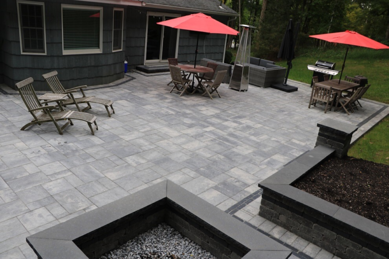 custom build grey stone patio - Landwork Contractors